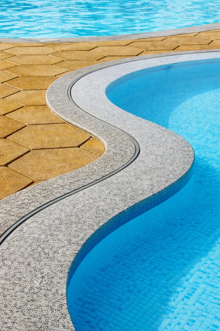Palm Beach House Curved Slot Drain — Auswave Products